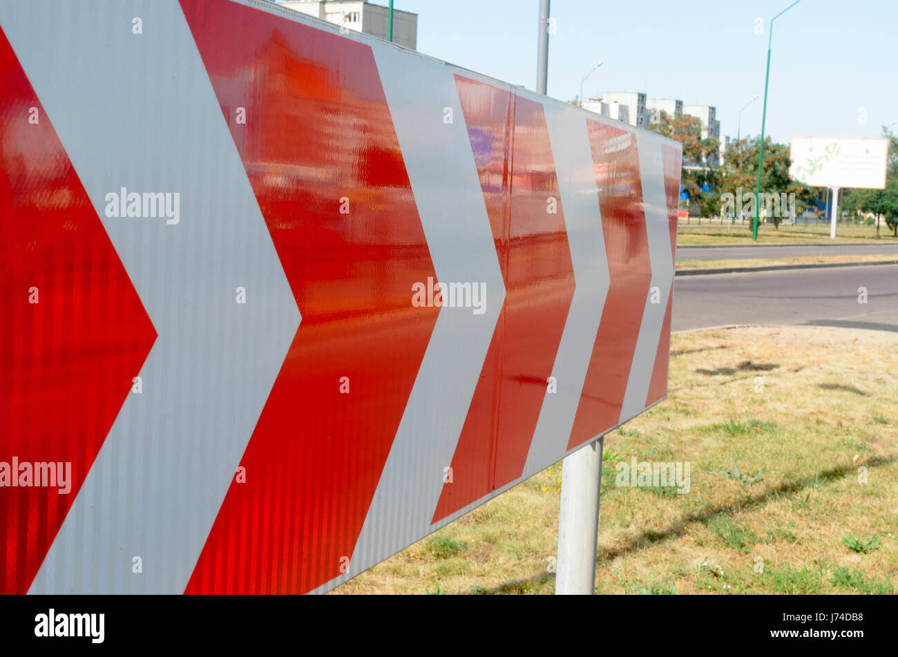 Road sign warning about changing the direction of motion Stock Photo ...