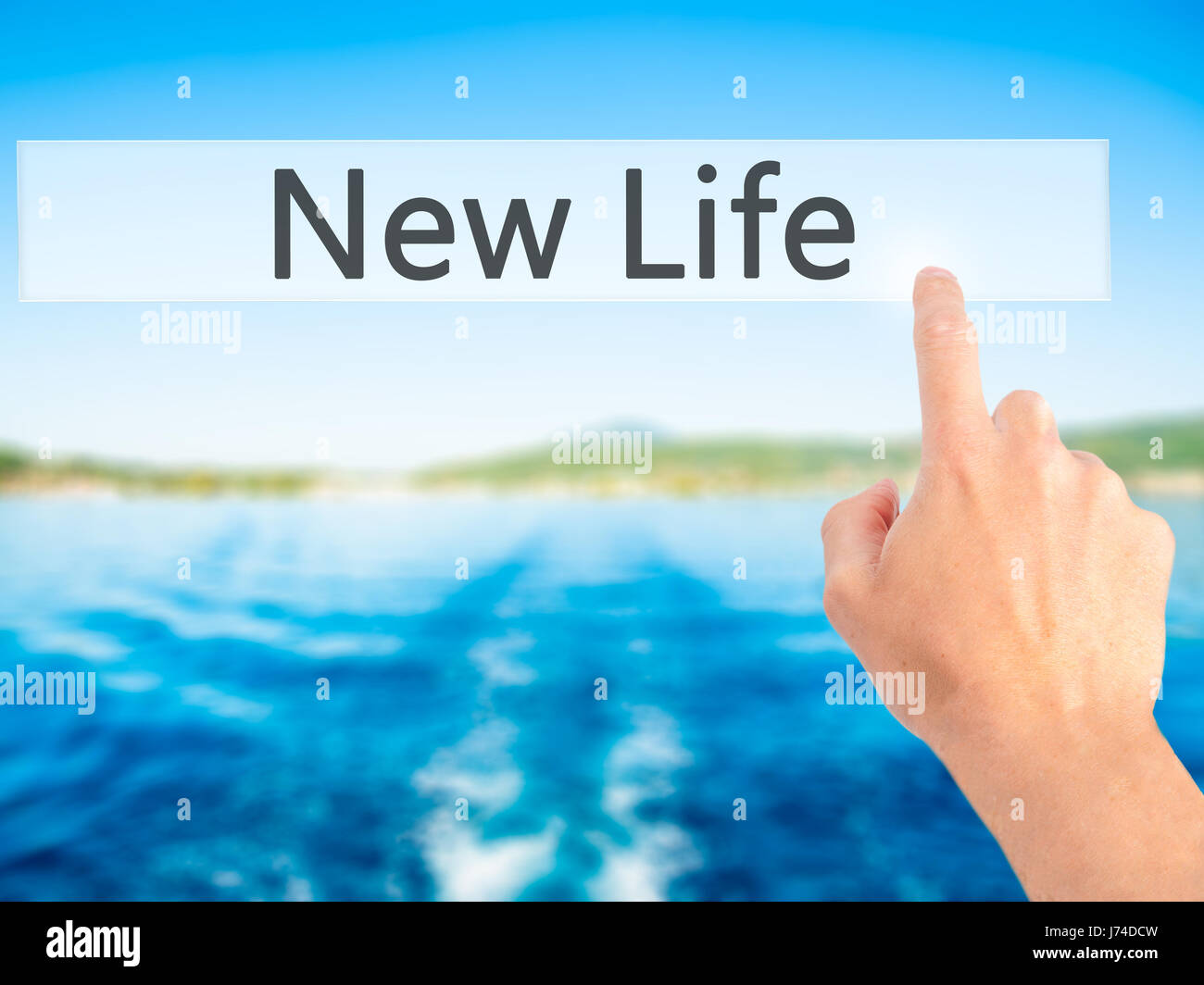 New Life - Hand pressing a button on blurred background concept ...