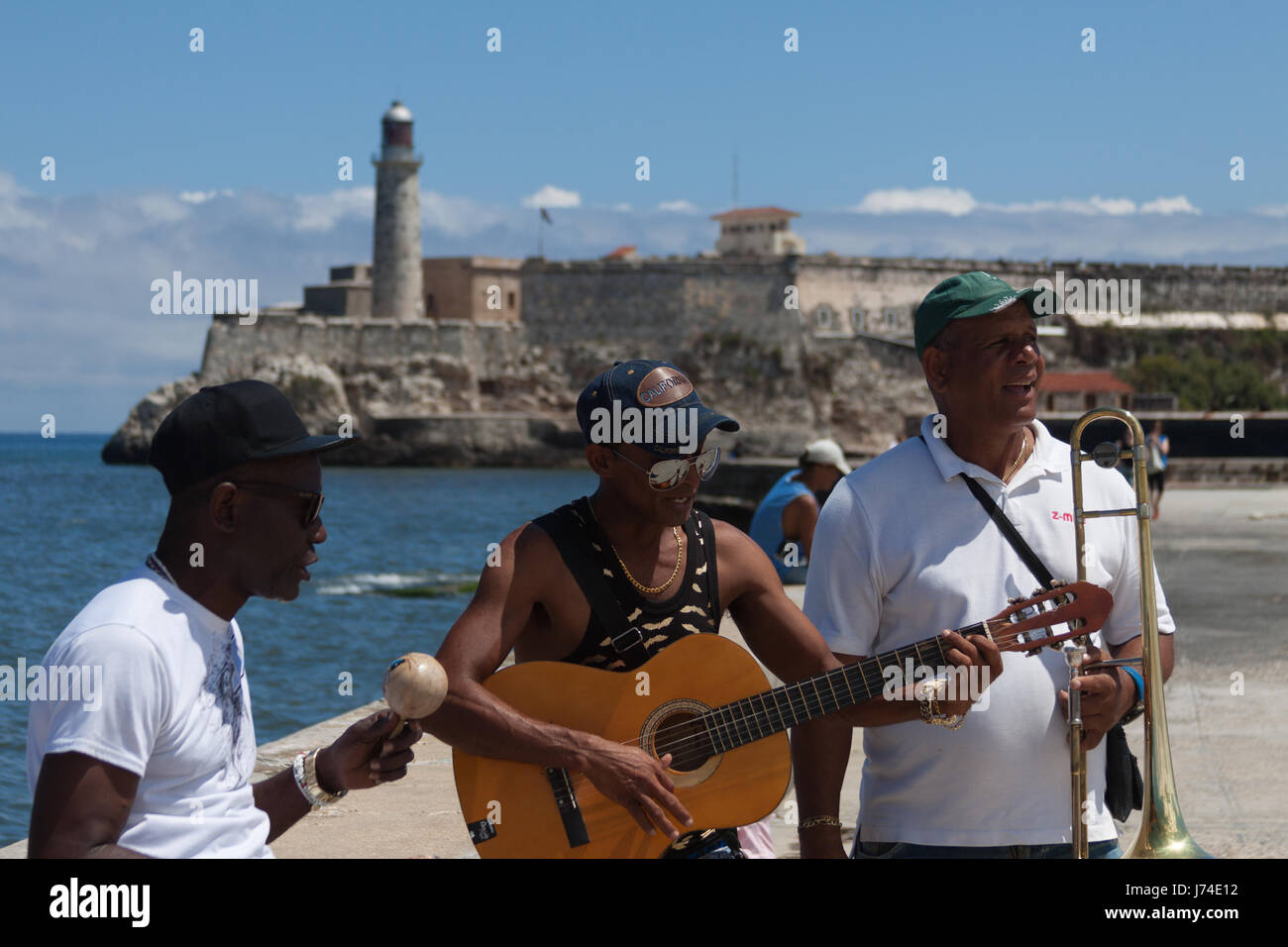 Cuban musicians playing at Malecon, Havana, Cuba Stock Photo - Alamy