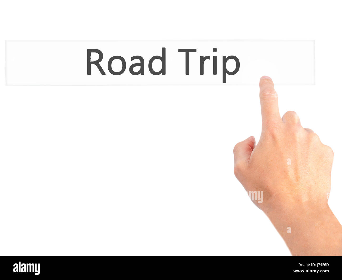 Road Trip - Hand pressing a button on blurred background concept ...