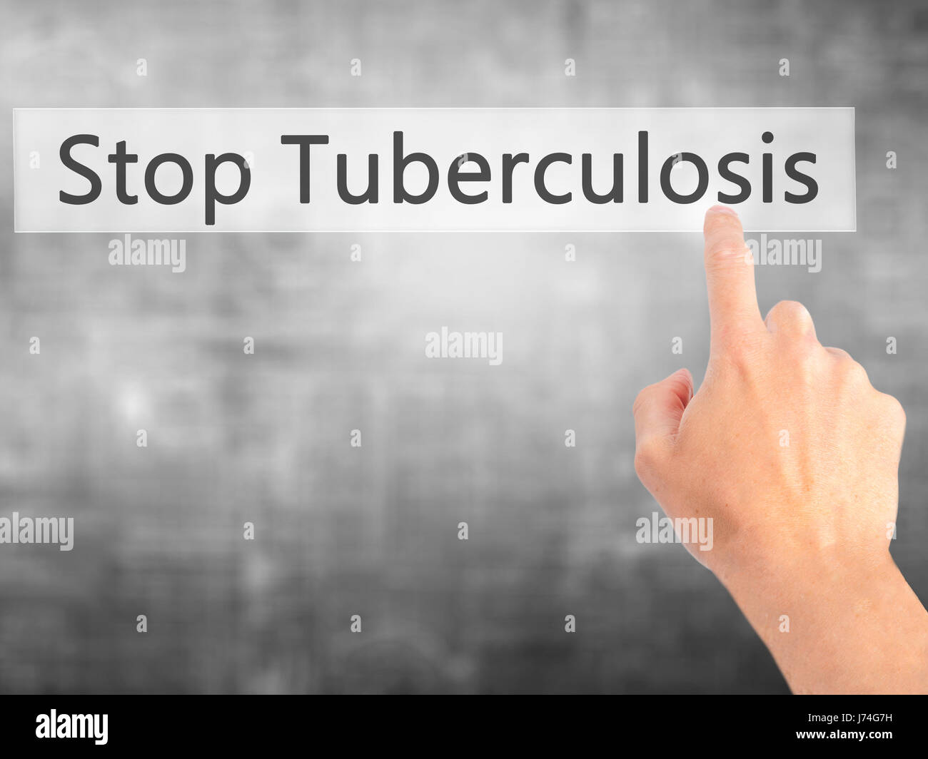 Stop Tuberculosis - Hand pressing a button on blurred background ...