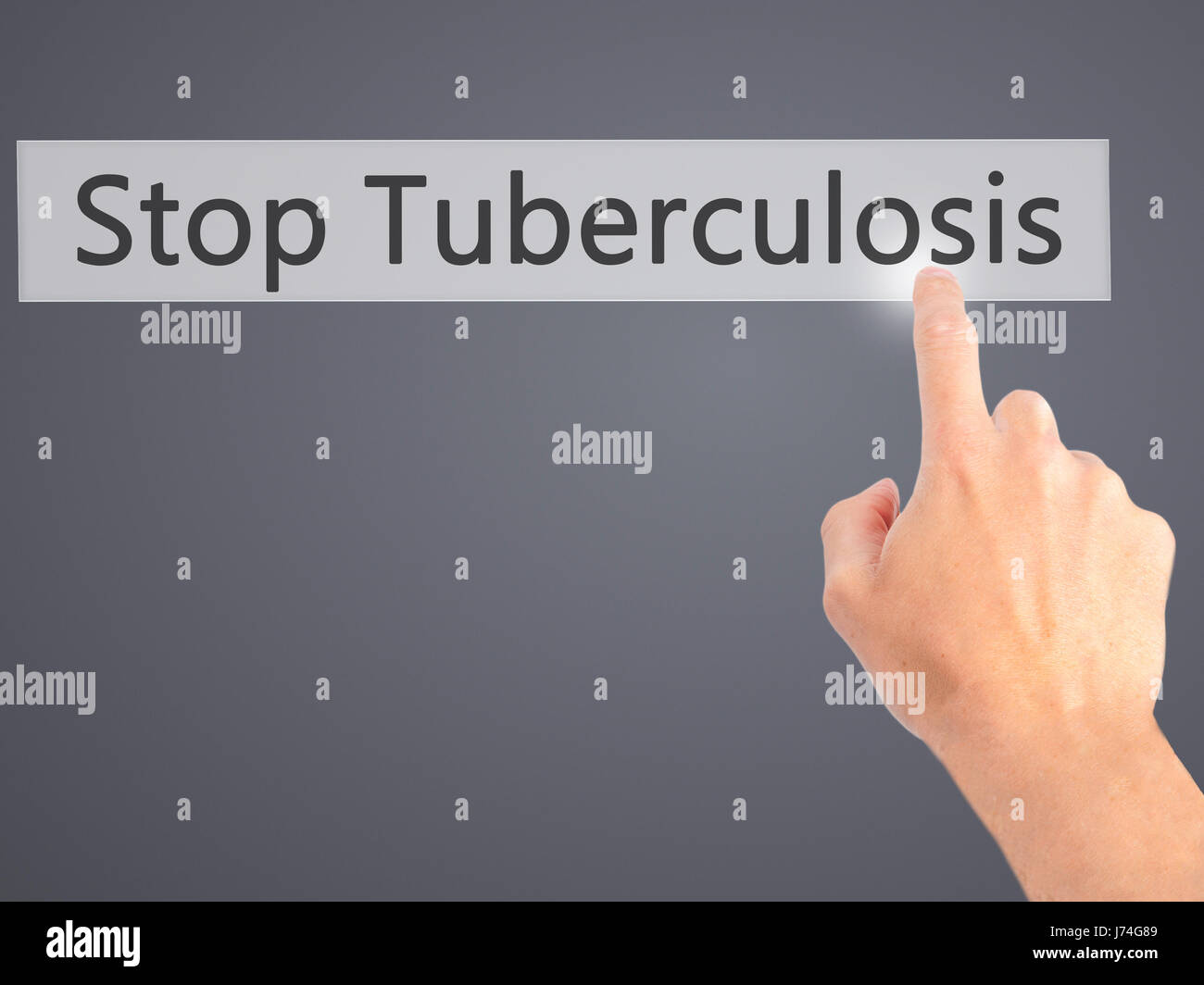Stop Tuberculosis - Hand pressing a button on blurred background ...