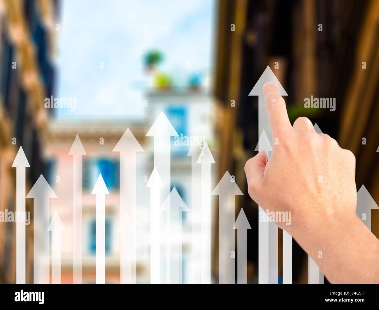 Businessman hand pressing Sales Growth Graph on virtual screen ...