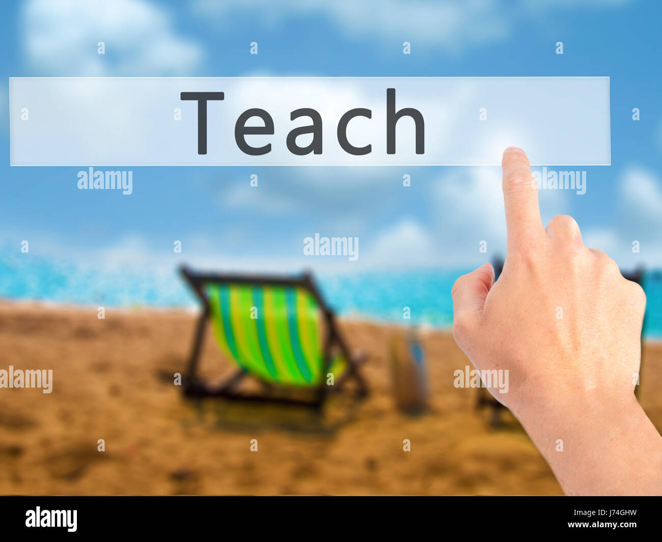 Teach - Hand pressing a button on blurred background concept . Business ...