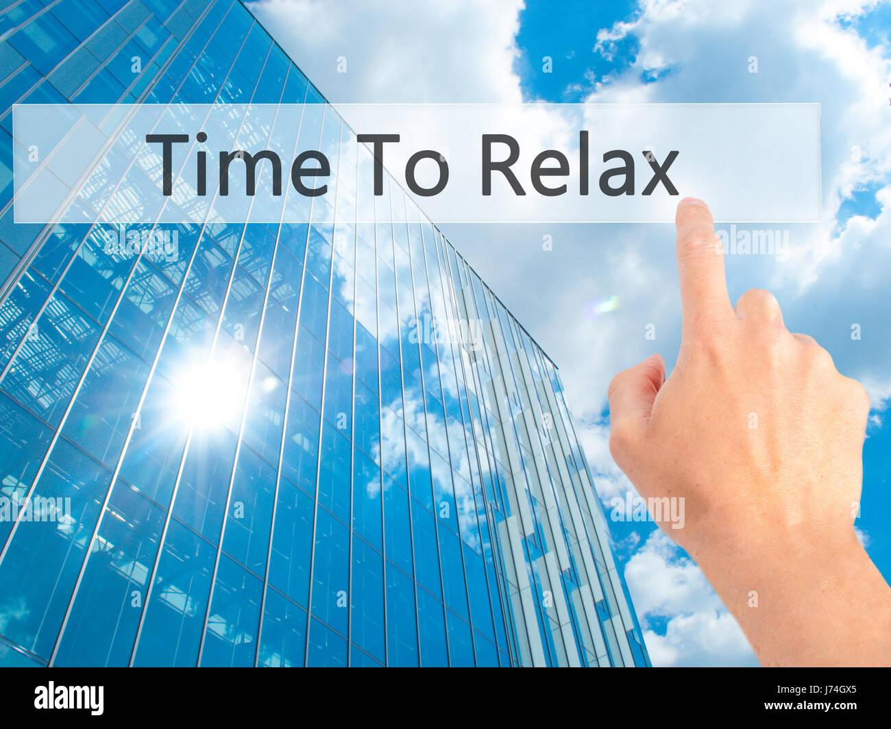Time To Relax - Hand pressing a button on blurred background concept ...
