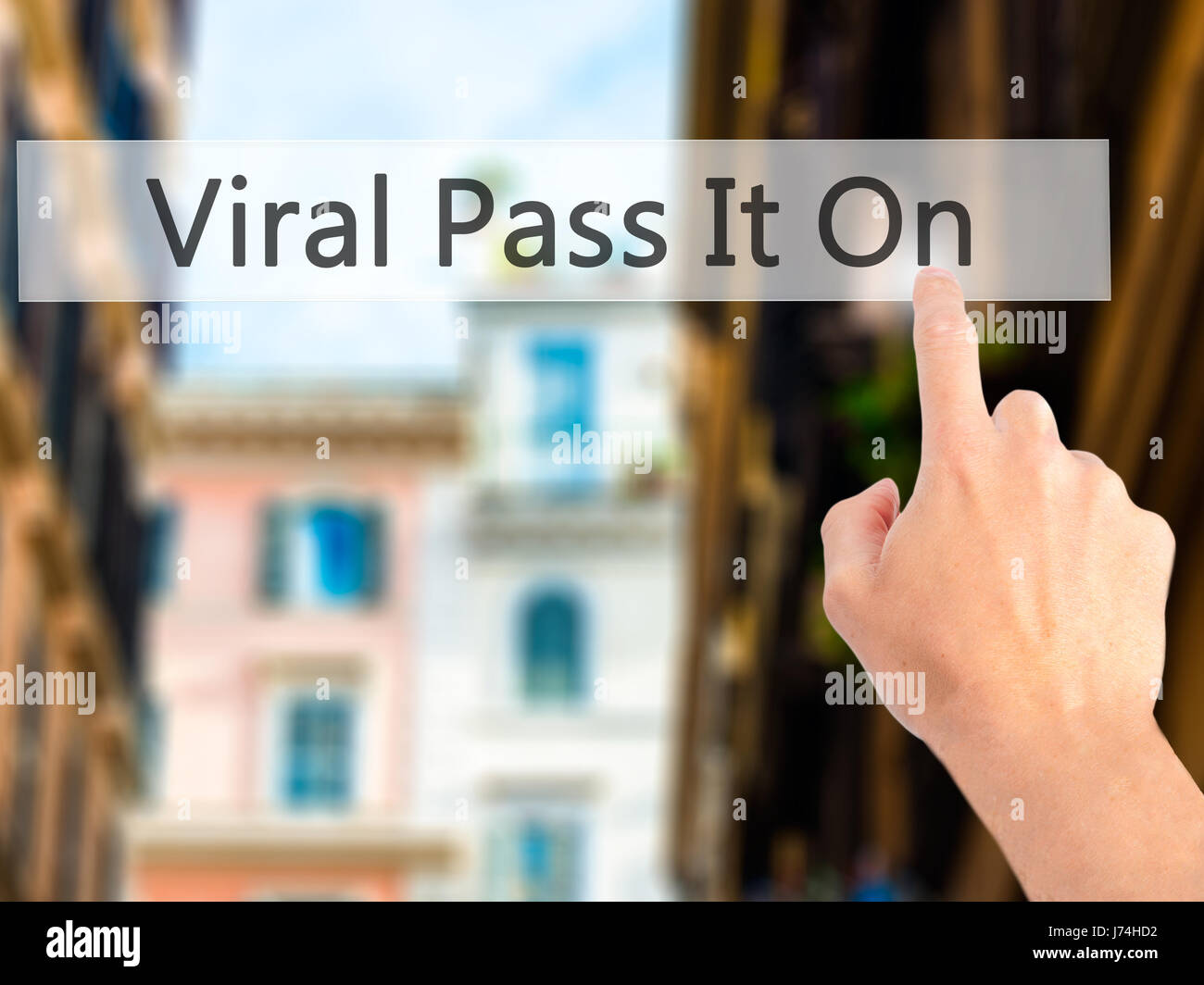 Viral Pass It On - Hand pressing a button on blurred background concept ...