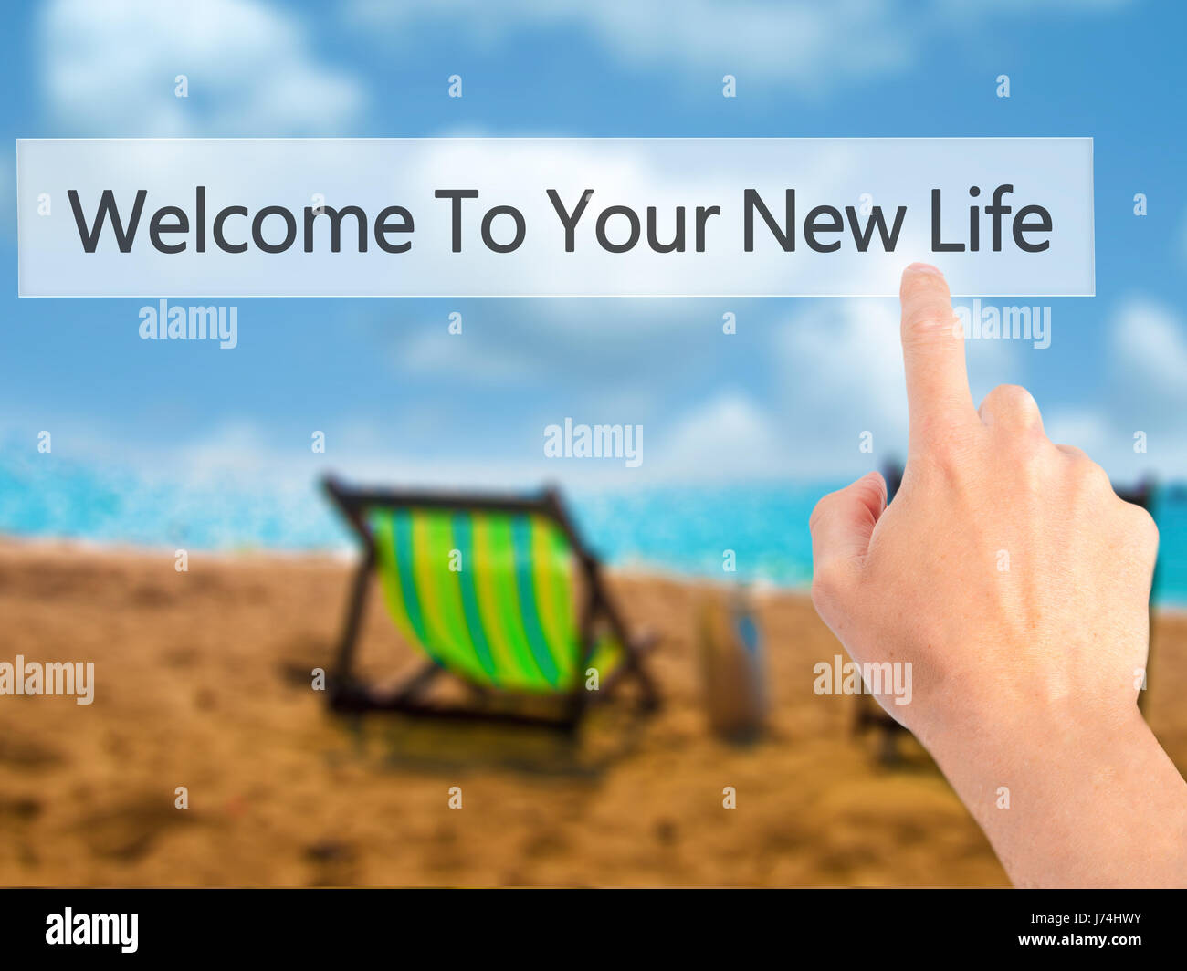 Welcome To Your New Life - Hand pressing a button on blurred background ...