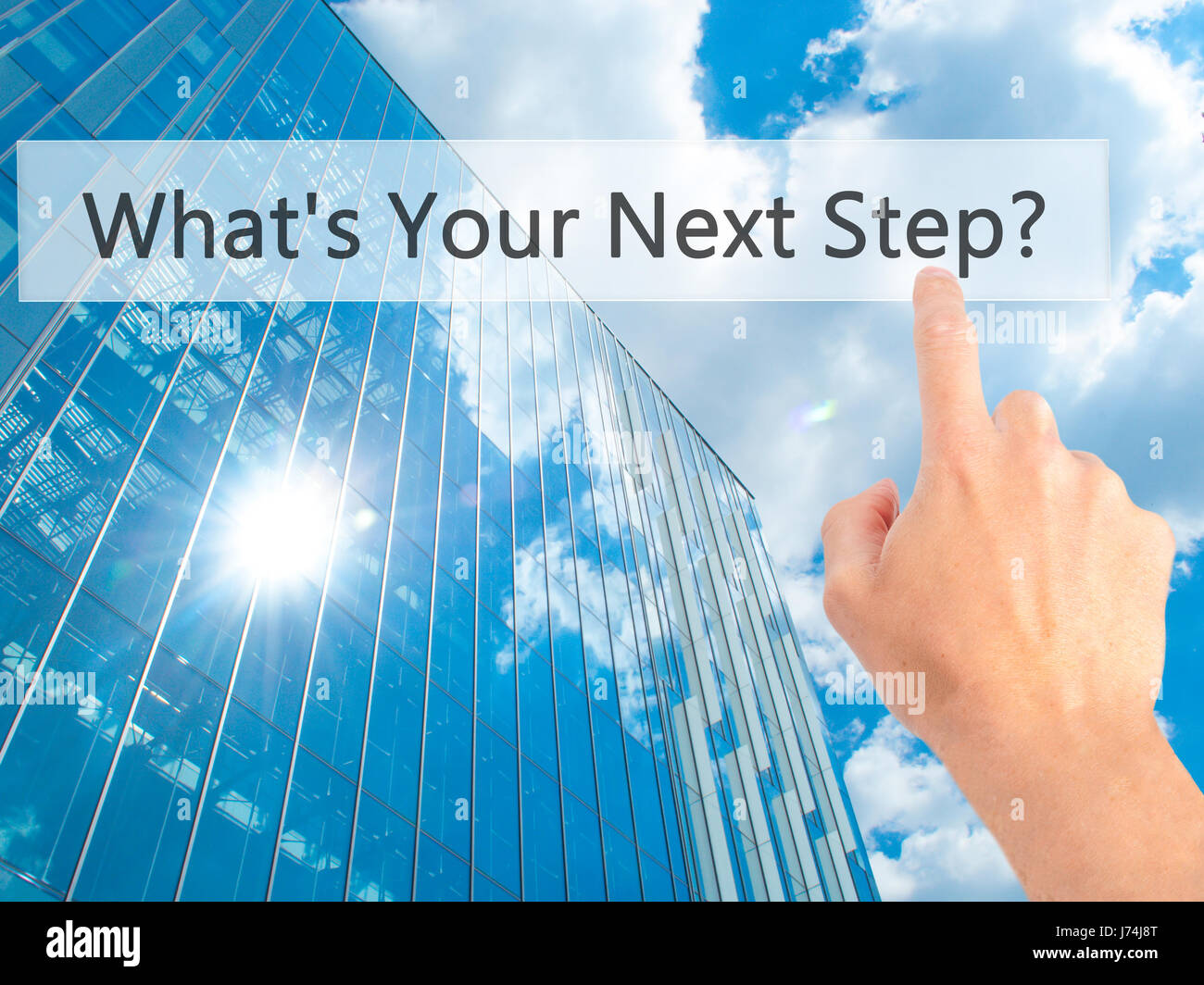 What's Your Next Step? - Hand pressing a button on blurred background ...