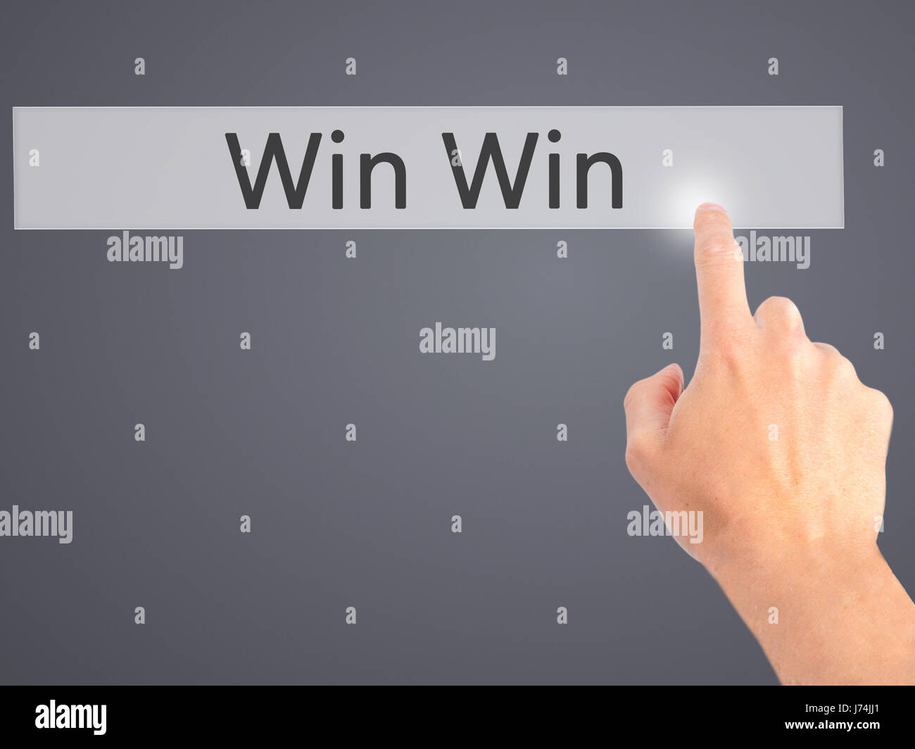 Win Win - Hand pressing a button on blurred background concept ...