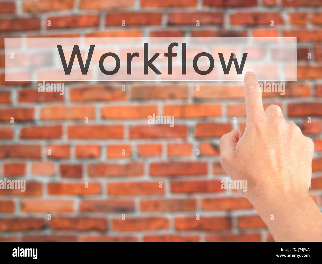 Workflow - Hand pressing a button on blurred background concept ...