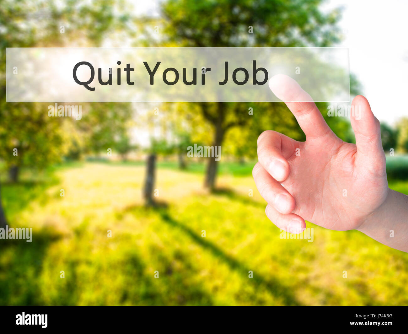 Quit Your Job - Hand pressing a button on blurred background concept ...