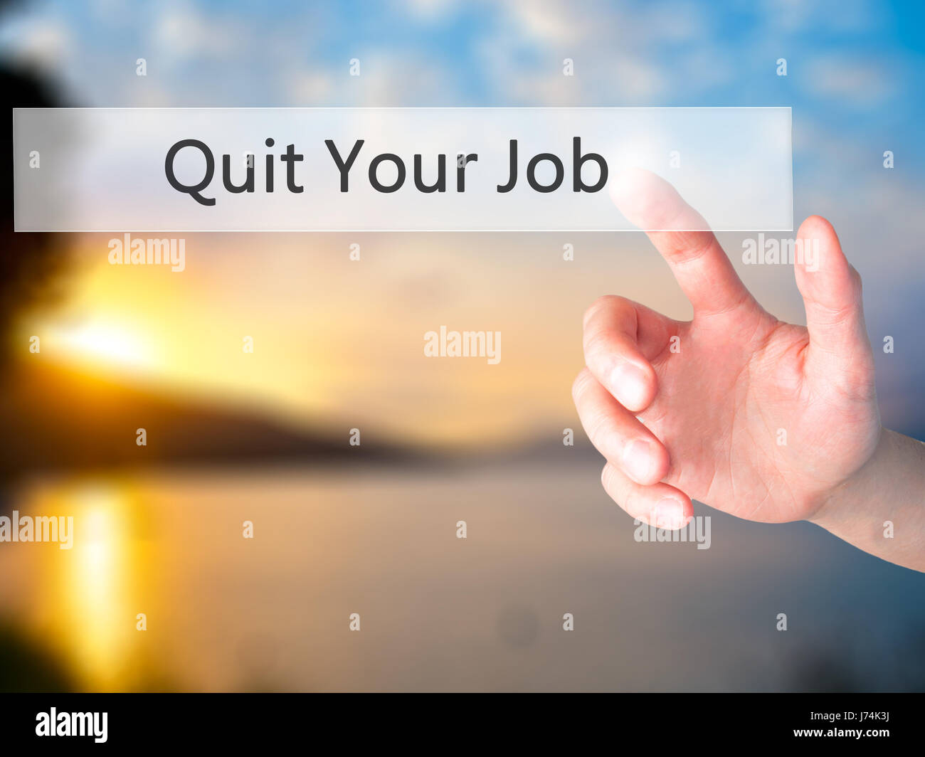 Quit Your Job - Hand pressing a button on blurred background concept ...