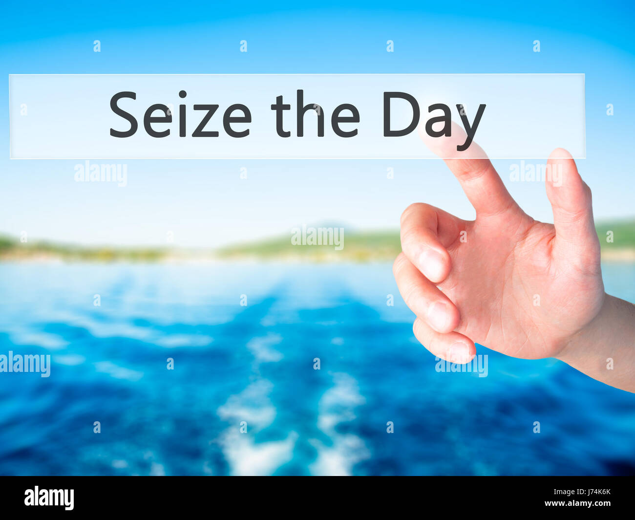 Seize the Day - Hand pressing a button on blurred background concept ...