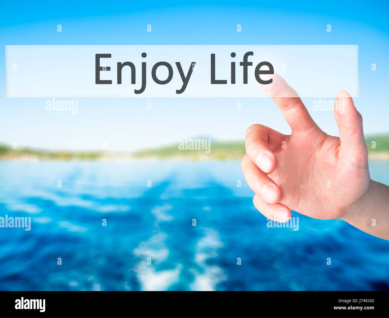 Enjoy Life - Hand pressing a button on blurred background concept ...