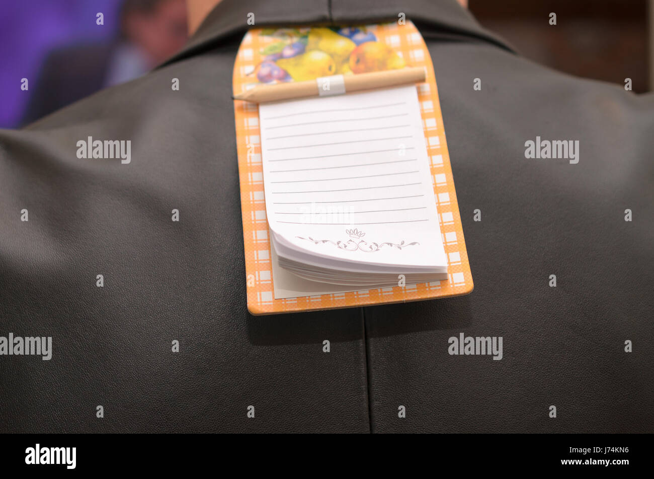 A note on the jacket behind the April Fools' joke Stock Photo - Alamy