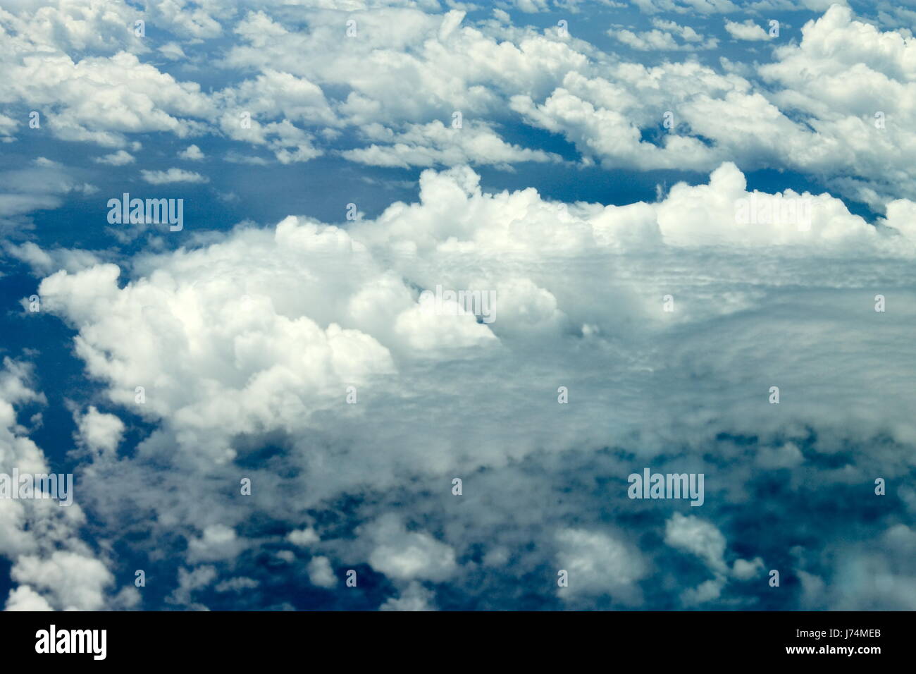 cloudscape taken from above from airplane Stock Photo - Alamy