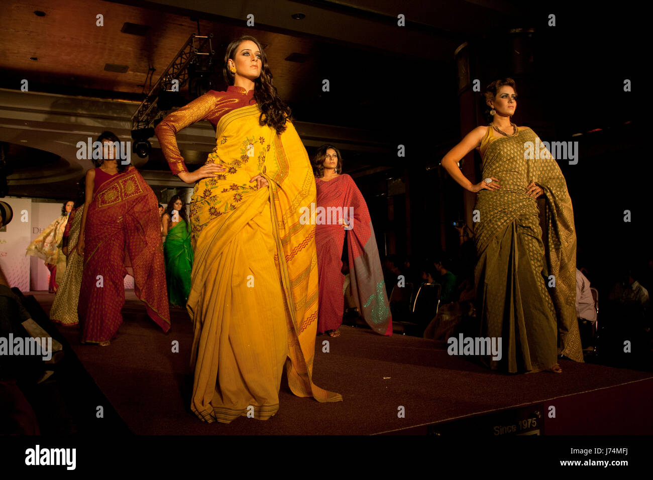Beautiful young fashion model girls posing on Dhaka Fashion Week event. Dhaka, Bangladesh Stock ...