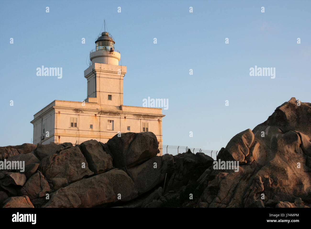 sunset evening coast landmark sardinia lighthouse italy tower colour ...