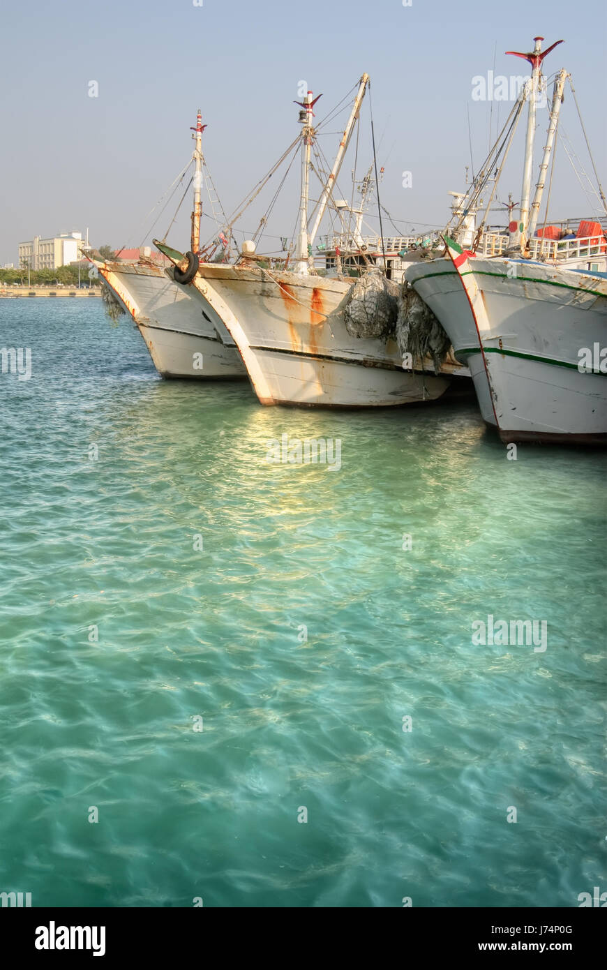harbor port boat colorful salt water sea ocean water lawn green rowing ...