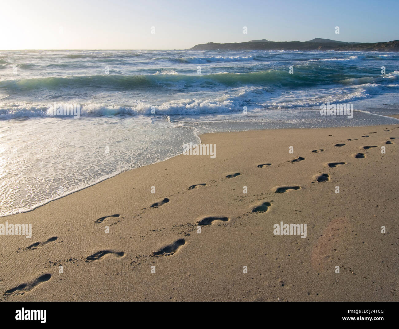 beach seaside the beach seashore coast footsteps trace salt water sea ...