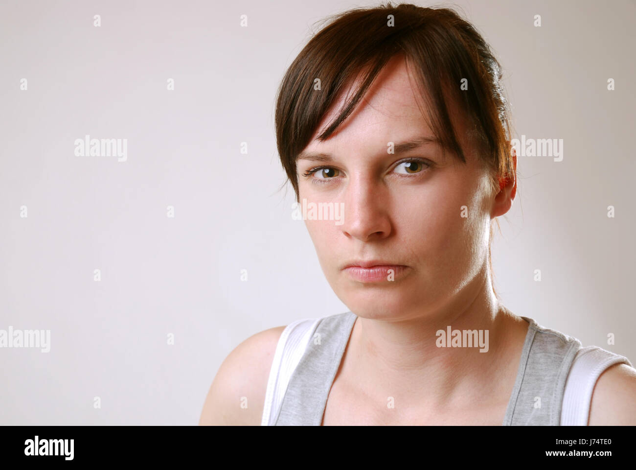 woman sour rage annoyed raving furious angry irately unhappy young ...