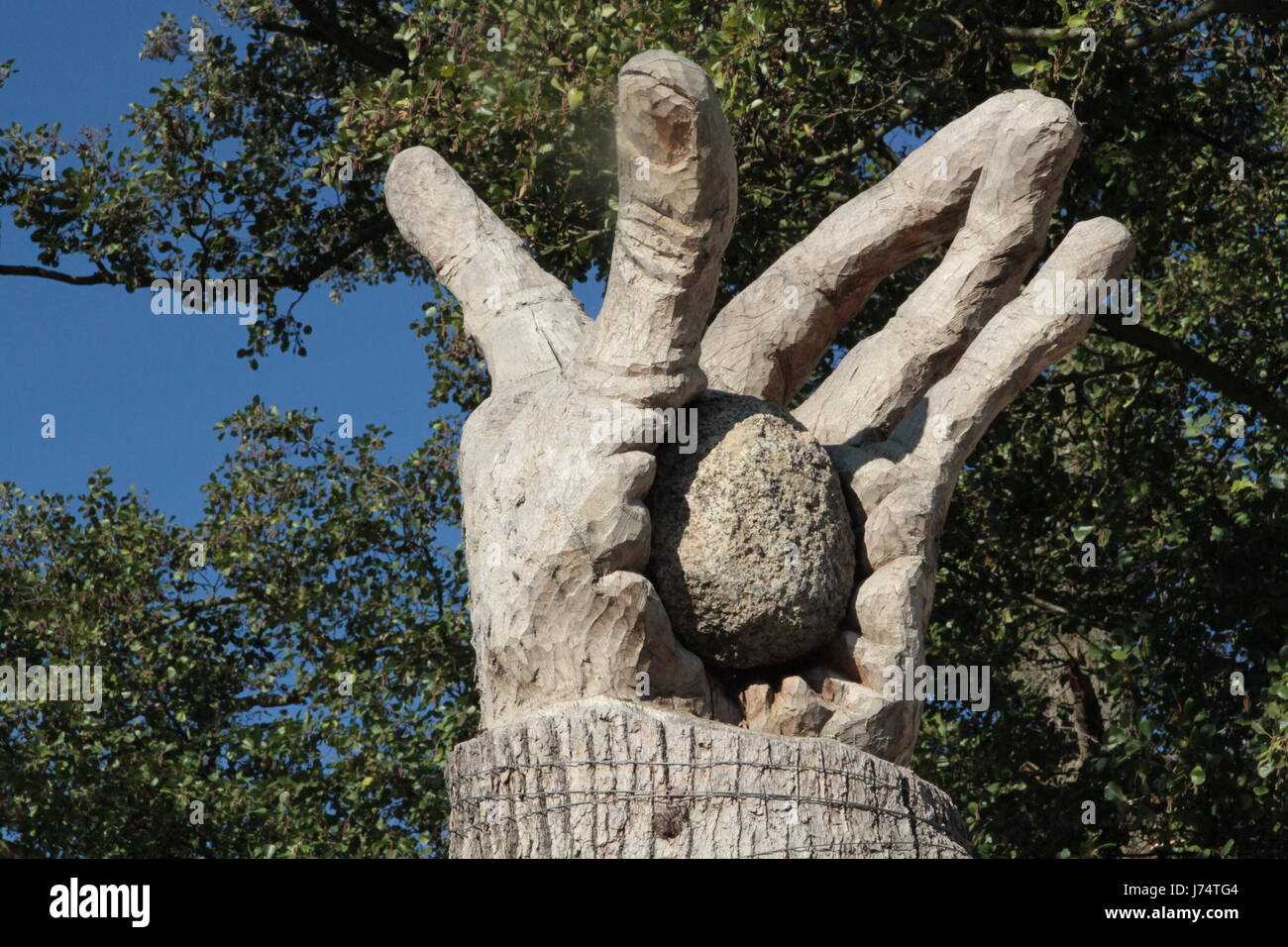 hand with stone Stock Photo - Alamy