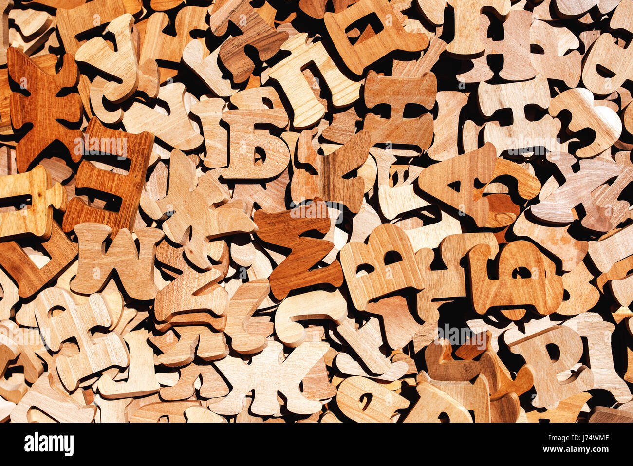 Pile of wooden letters as literacy and education background Stock Photo ...