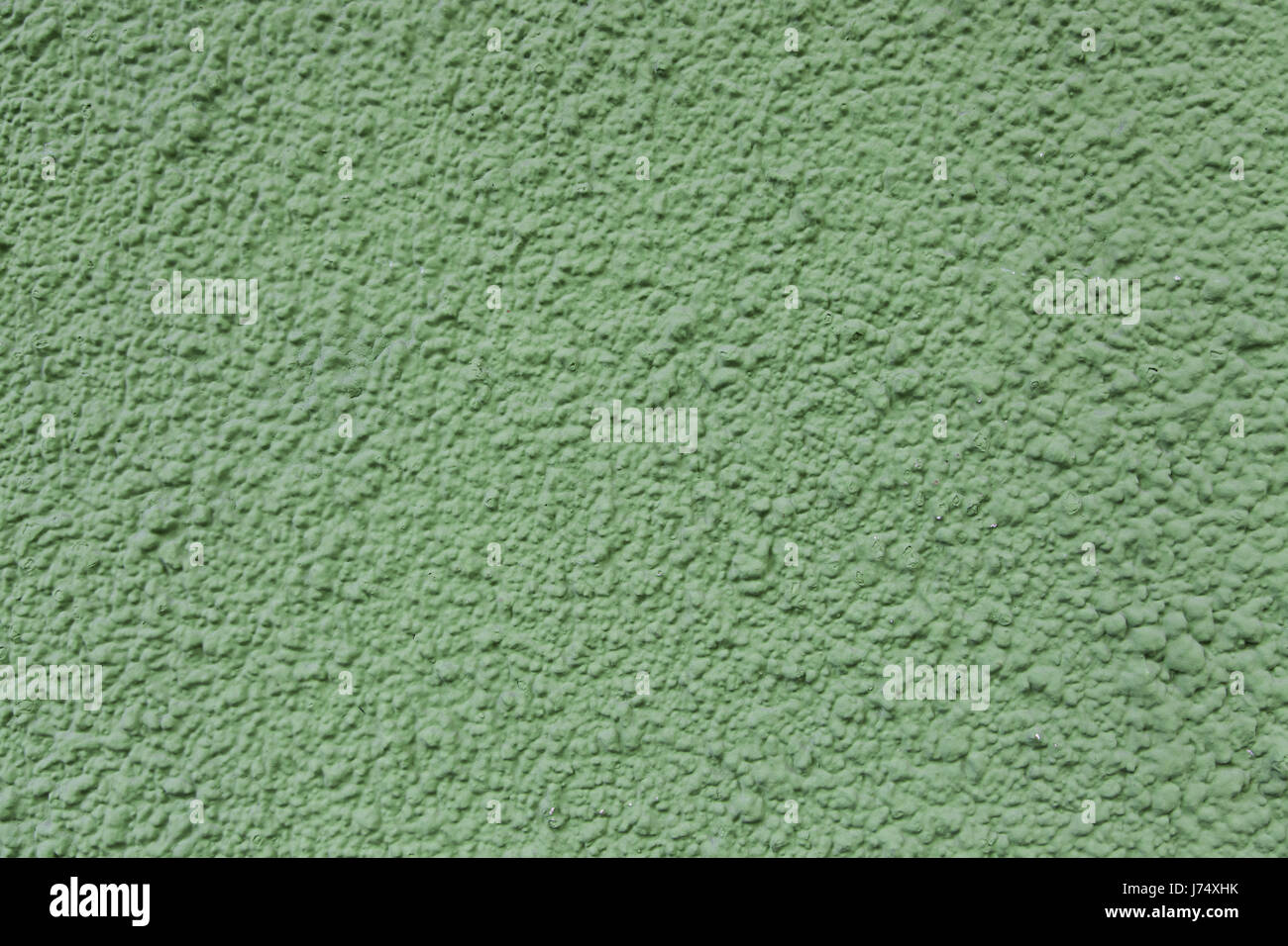 Green wall with texture, detail of a color textured background ...