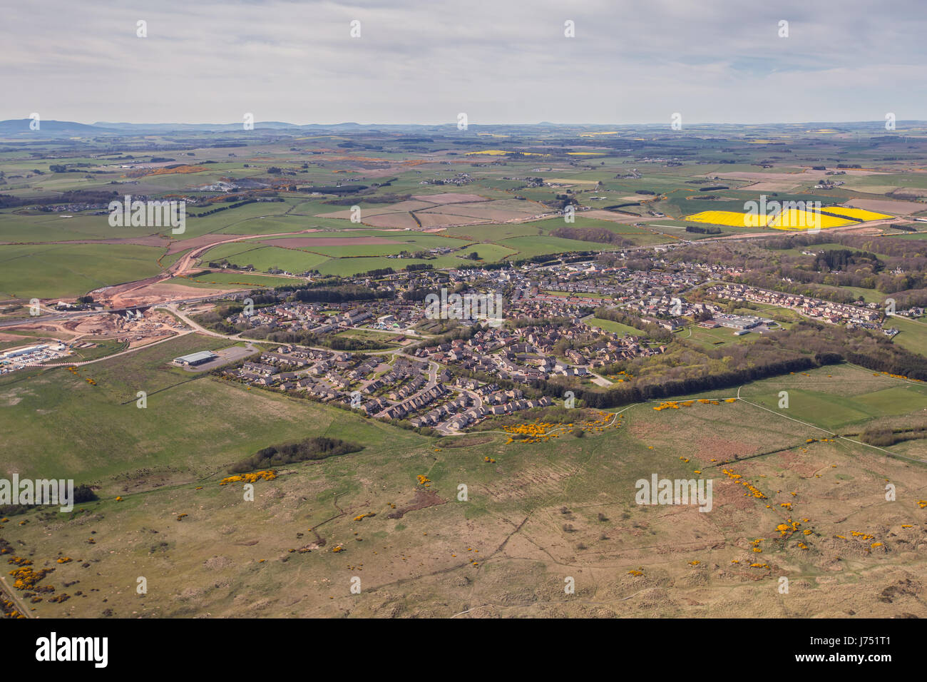 Aerial photograph of the town of Balmedie near the city of Aberdeen in ...