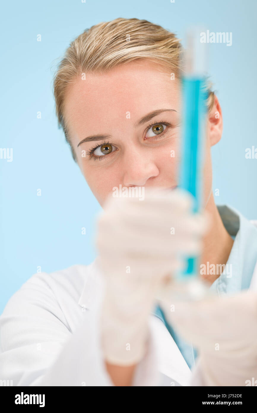 woman experiment research laboratory scientist woman liquid experiment ...