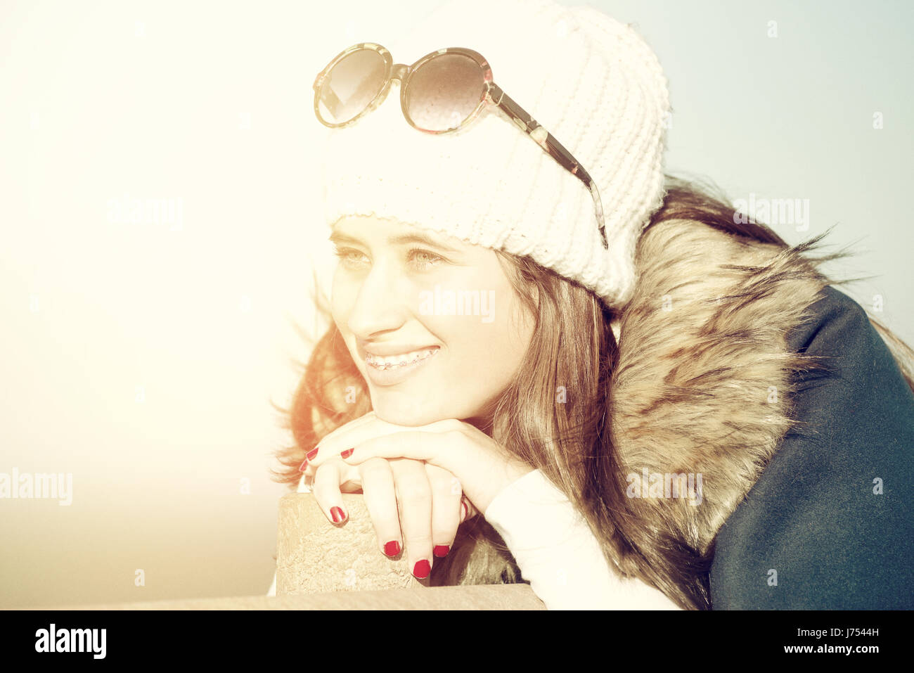Beautiful and happy young girl posing outdoors Stock Photo - Alamy
