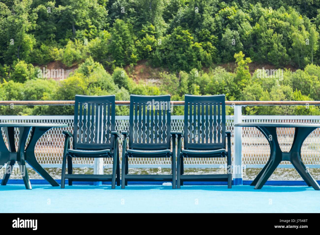 Sun loungers on deck Stock Photo - Alamy