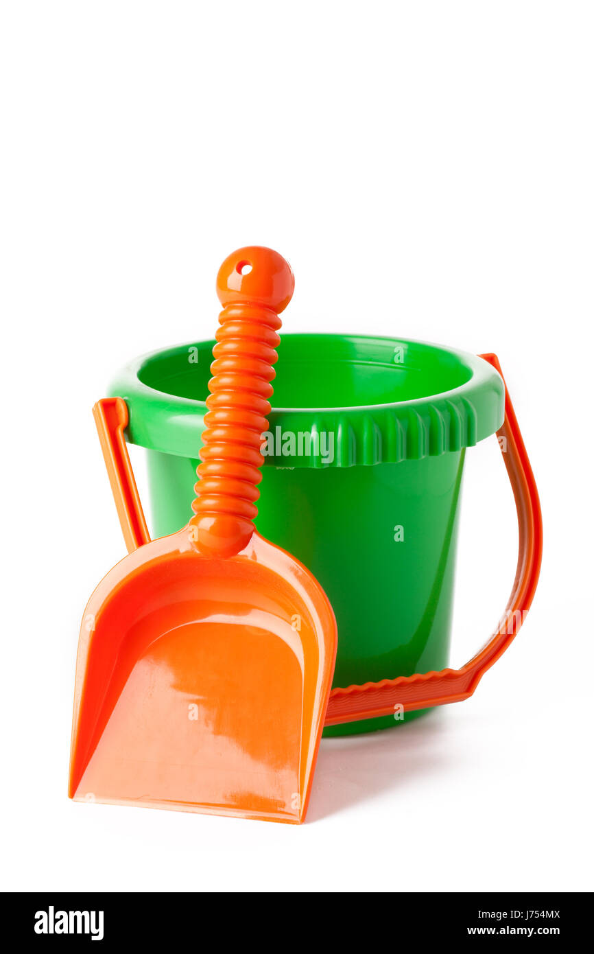 Beach children playing bucket Cut Out Stock Images & Pictures - Alamy