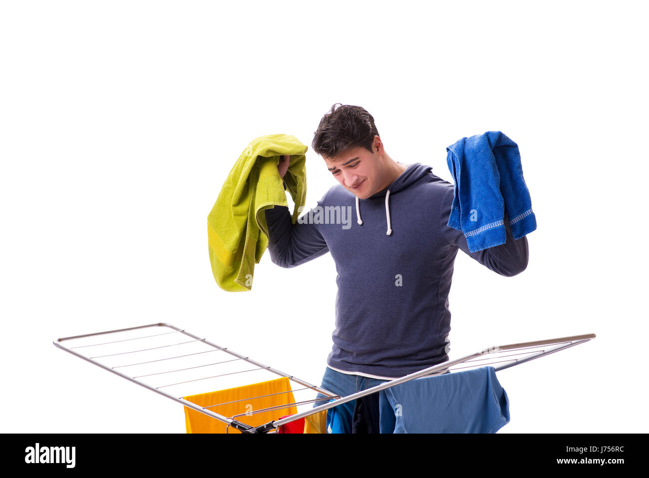 Husband man doing laundry isolated on white Stock Photo - Alamy