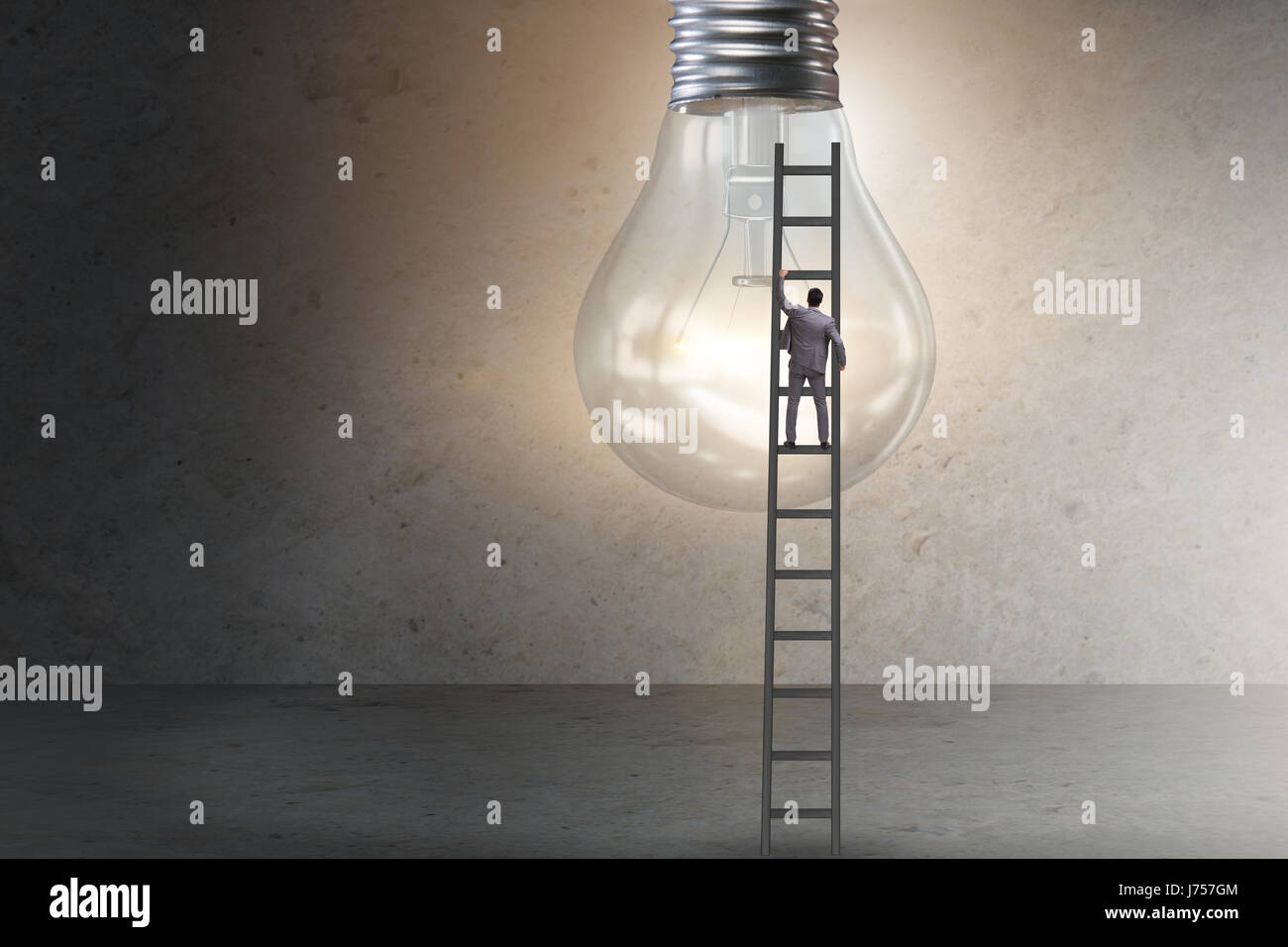Businessman on ladder with light bulb Stock Photo - Alamy