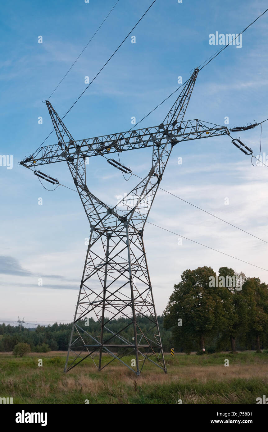 transmission power line in sunset Stock Photo - Alamy