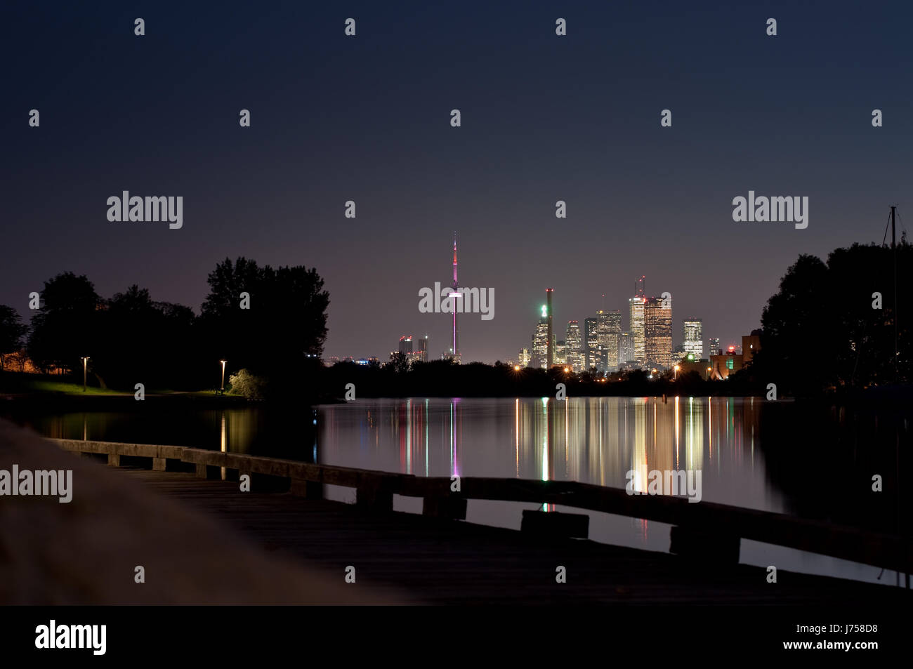 city town night nighttime skyline tree trees night nighttime lights ...