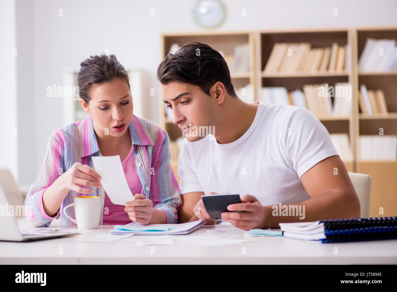 Couple finances happy receipt hi-res stock photography and images - Alamy