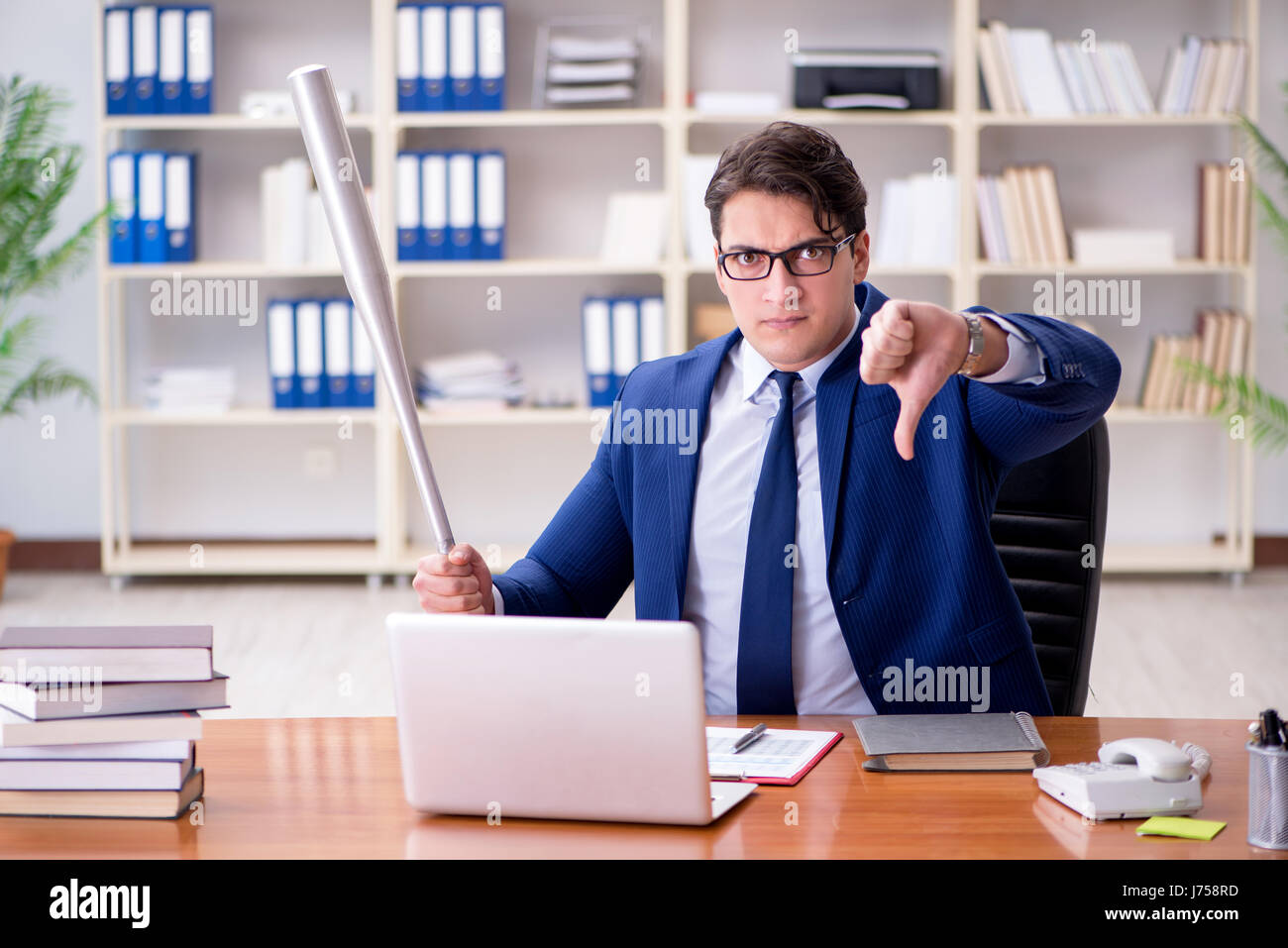 Angry aggressive businessman in the office Stock Photo - Alamy