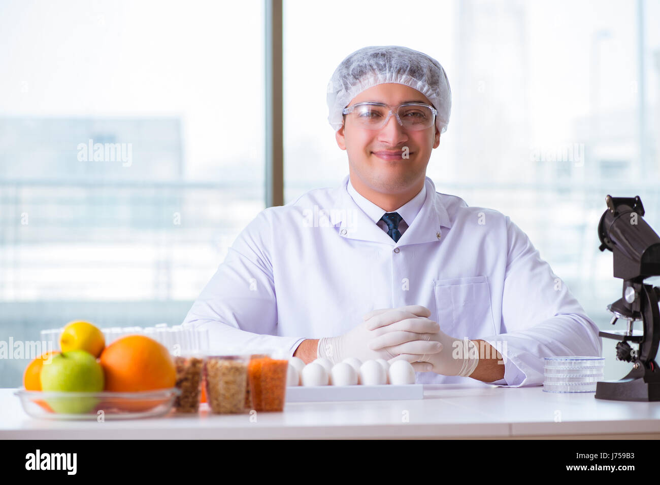 Nutrition expert testing food products in lab Stock Photo - Alamy