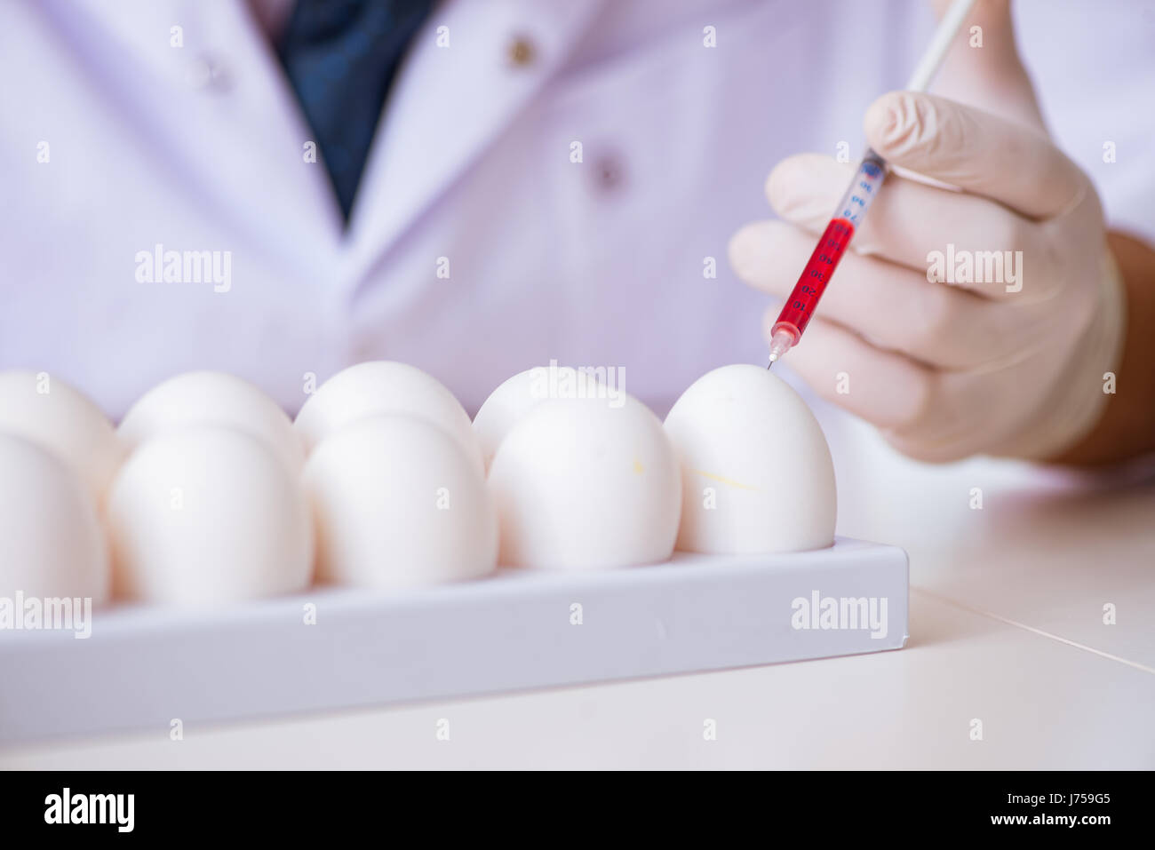 Nutrition expert testing food products in lab Stock Photo - Alamy
