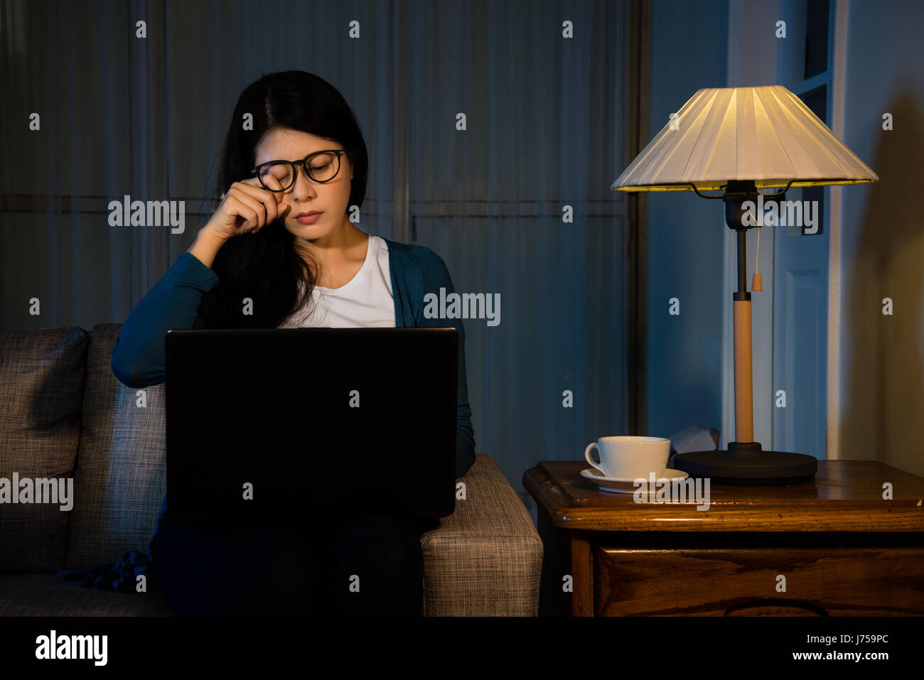 tiring lady feeling eyes uncomfortable when using portable computer all ...