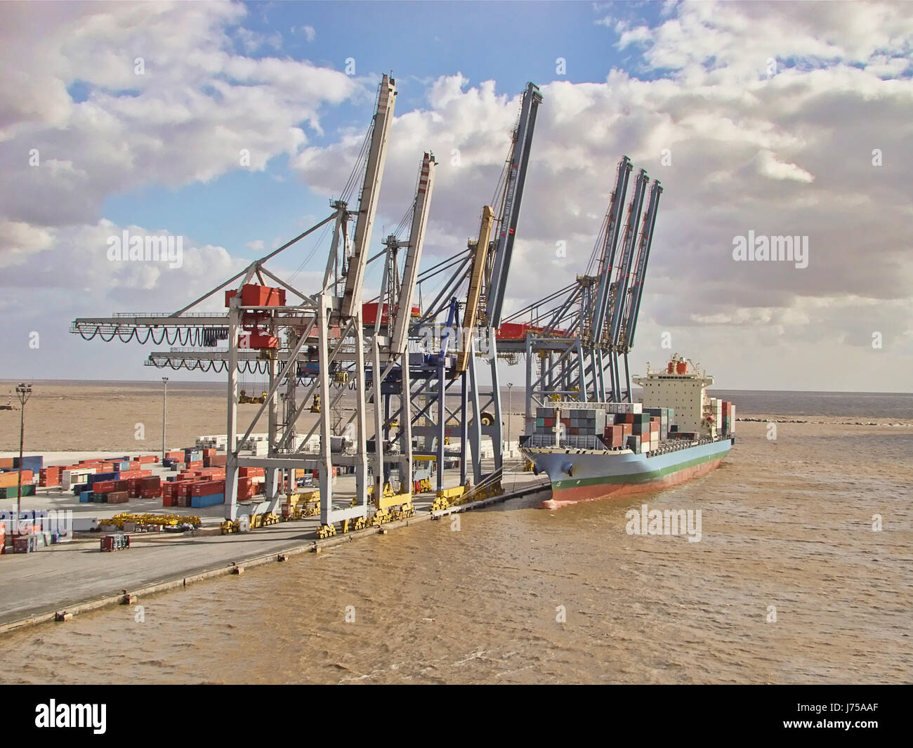 container ship cargo shipping containers sailing boat sailboat rowing ...