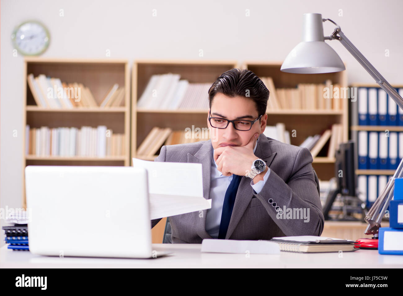 Businessman receiving letter in the office Stock Photo - Alamy