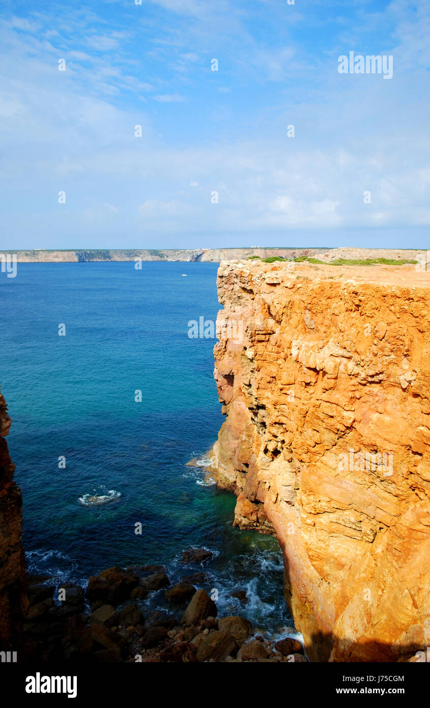 beach seaside the beach seashore rock portugal coast mountain blue ...