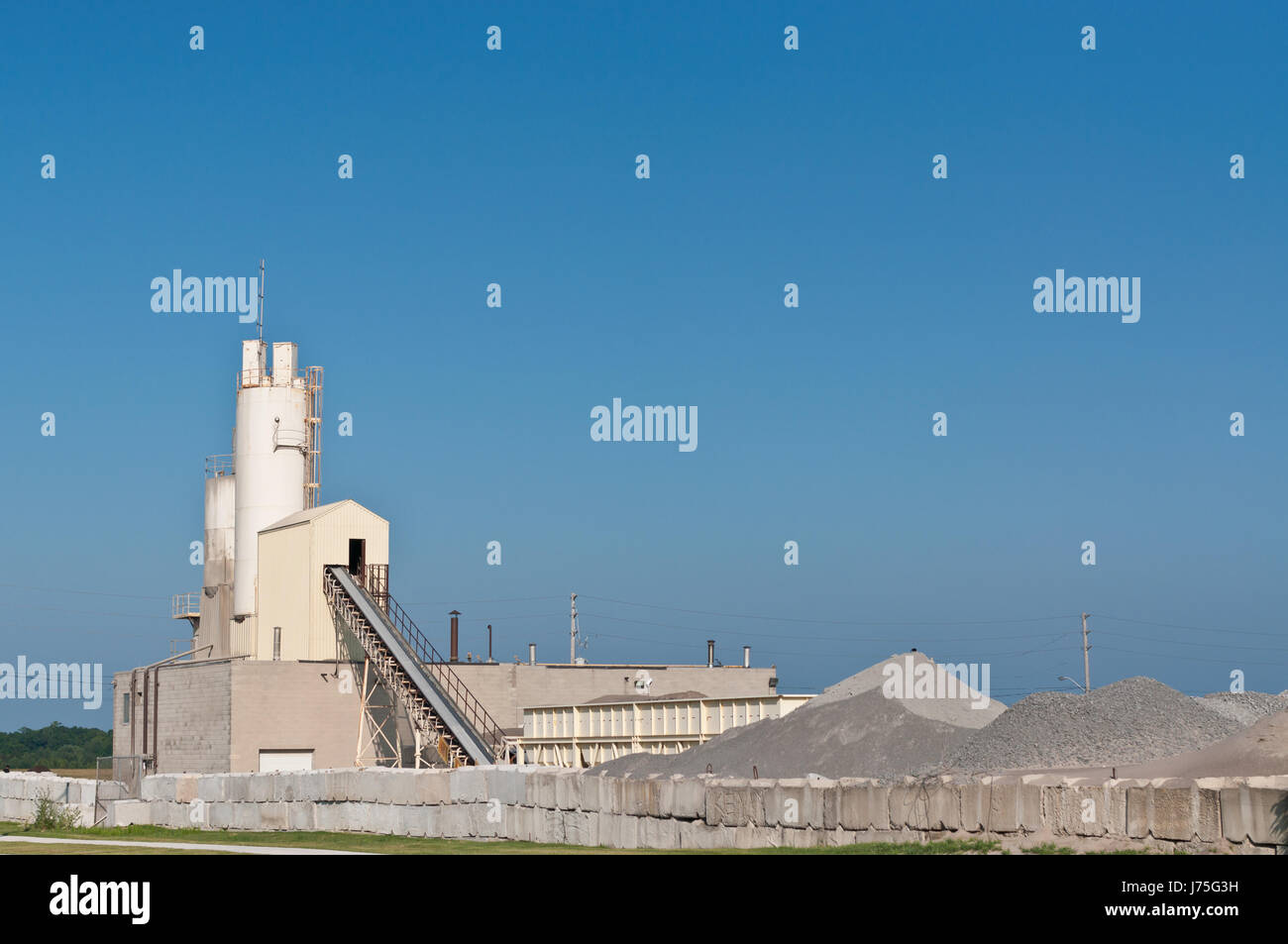 industry concrete work factory cement blue industry concrete horizontal gravel Stock Photo - Alamy