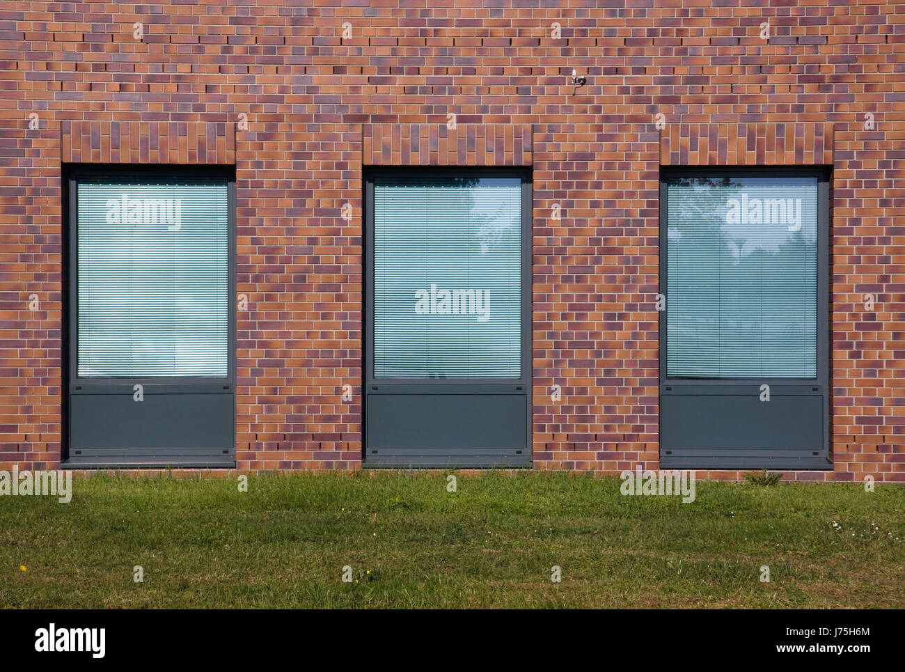 facade with three doors Stock Photo - Alamy