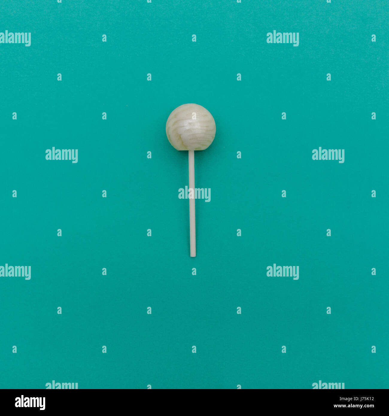 Lollipop Flat lay Minimal concept White round lollipop is lying on a ...