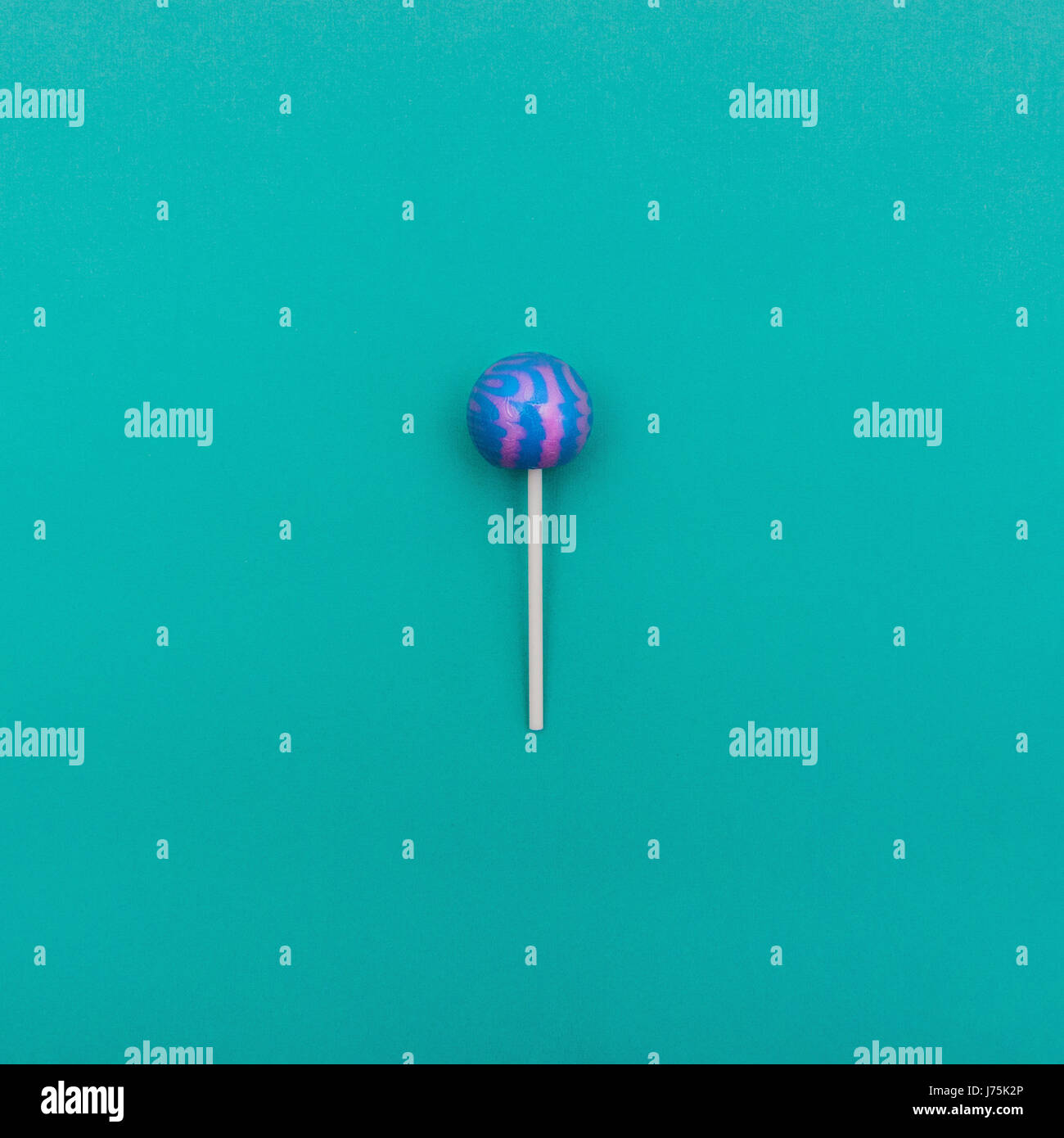 Lollipop Flat lay Minimal concept Blue round lollipop is lying on a ...