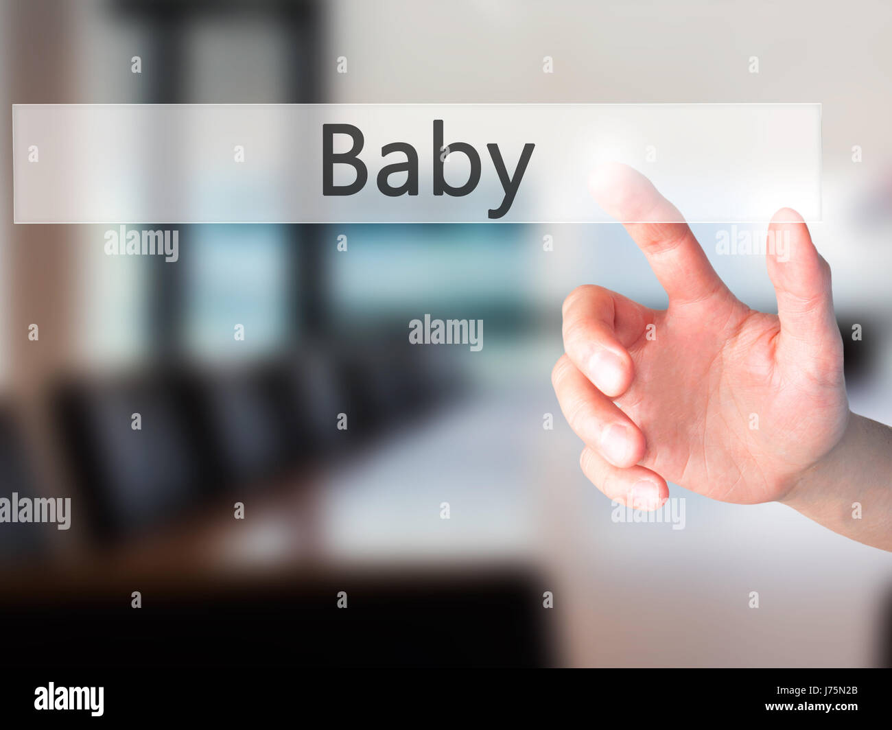 Baby - Hand pressing a button on blurred background concept . Business ...
